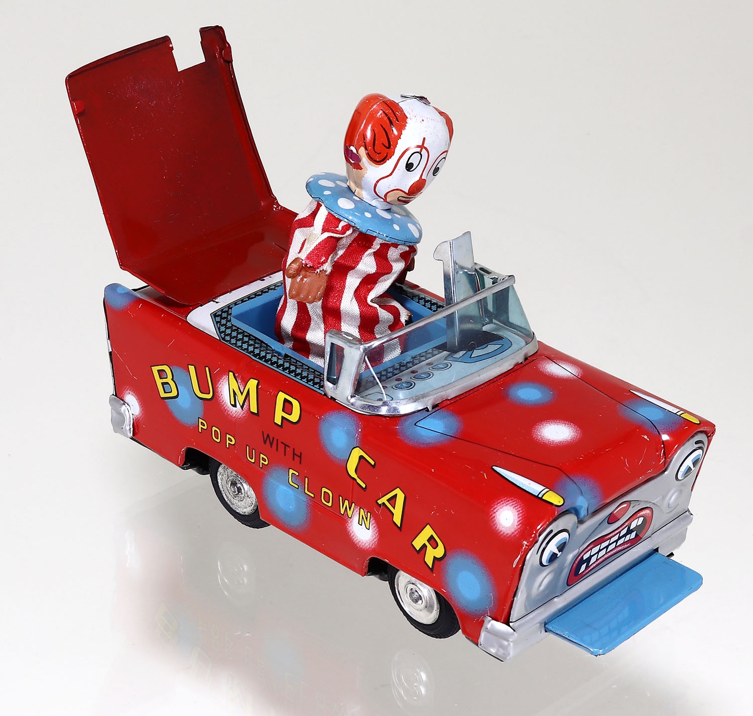 BUMP CAR WITH POP UP CLOWN