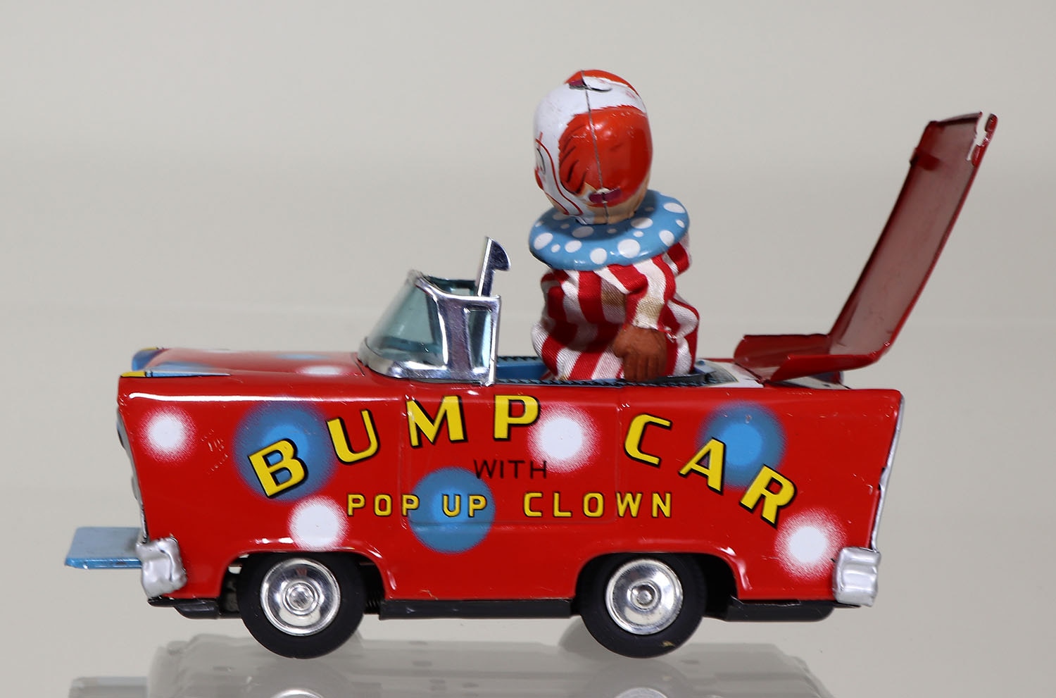 BUMP CAR WITH POP UP CLOWN