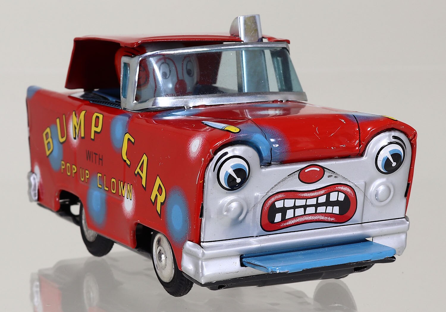 BUMP CAR WITH POP UP CLOWN