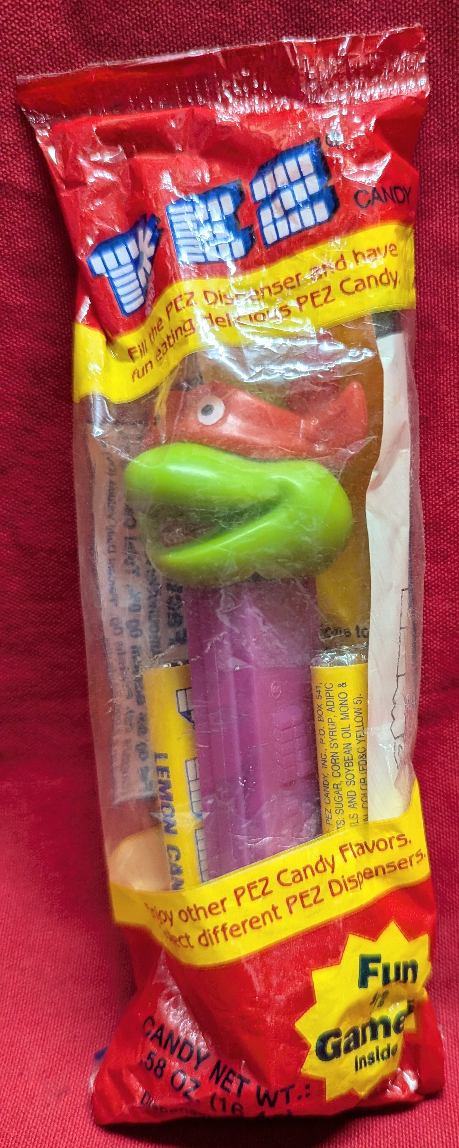PEZ ペッツPEZ アメリカンバッグス赤 ラファエロスマイル/笑う顔/ステム紫/アメリカンバッグス赤 ステム紫 | まんだらけ Mandarake