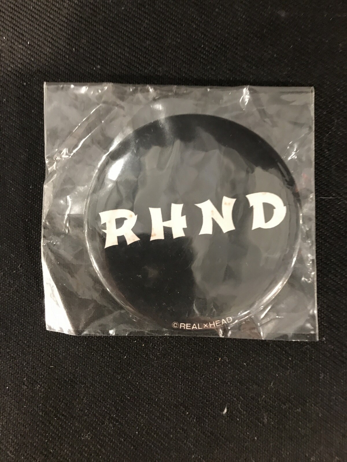 REALHEAD RHND 缶バッジ 黒 | まんだらけ Mandarake